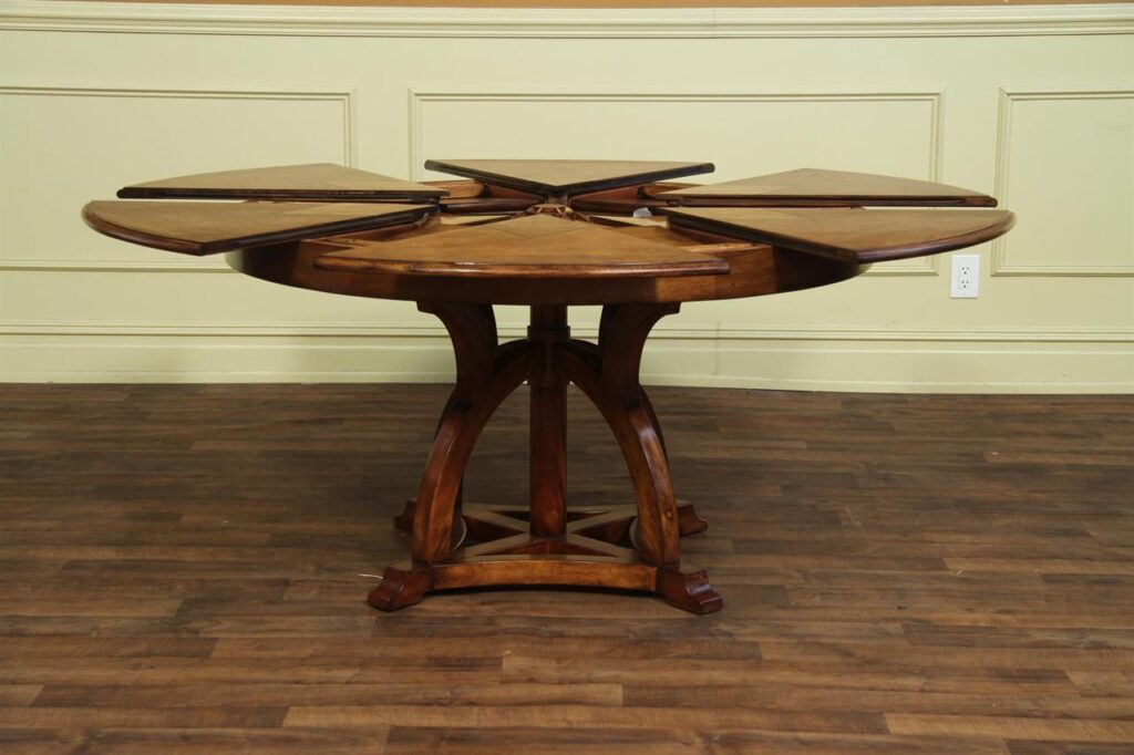 Arts and crafts round dining table with self storing leaves