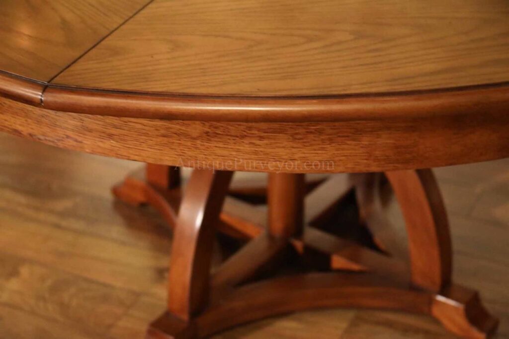 Arts and crafts round dining table with self storing leaves