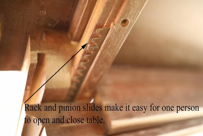 48-Inch Round Walnut Dining Table with Self-Storing Leaf