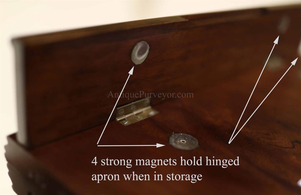 Round to oval dining table in dark walnut finish, with self-storing ...