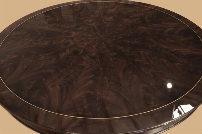 Round to oval dining table in dark walnut finish, with self-storing ...