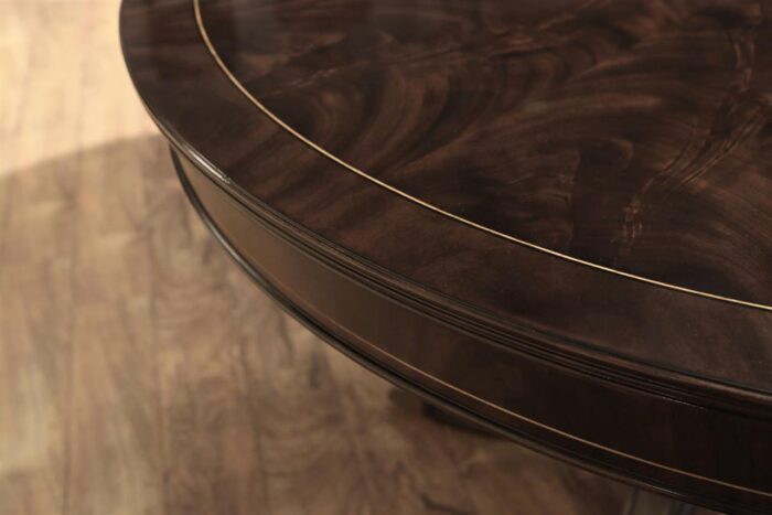 Round to oval dining table in dark walnut finish, with self-storing ...