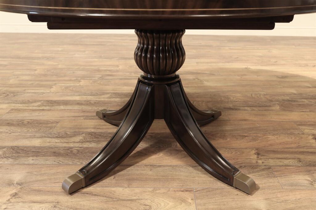 Round to oval dining table in dark walnut finish, with self-storing ...