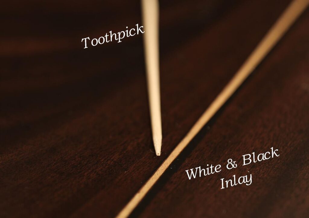 Round to oval dining table in dark walnut finish, with self-storing ...