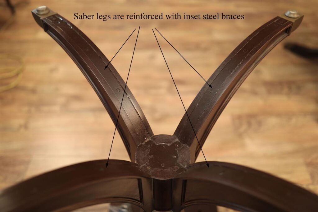 Round to oval dining table in dark walnut finish, with self-storing ...