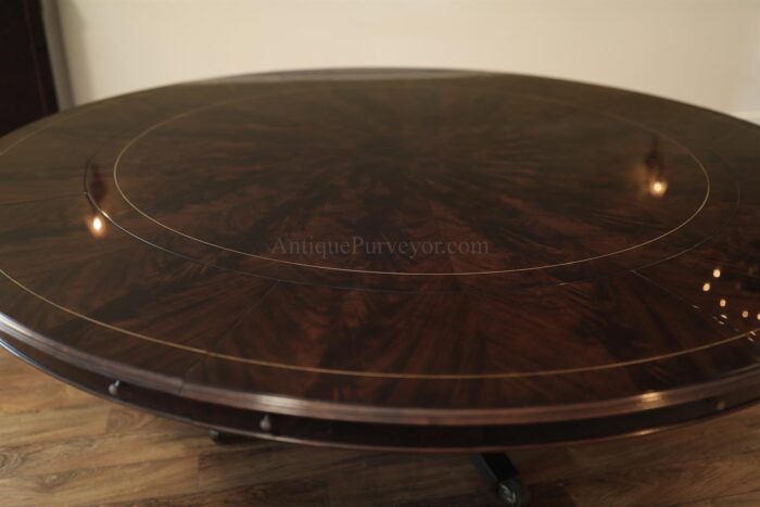 Large round expandable mahogany dining table with matching leaf storage ...
