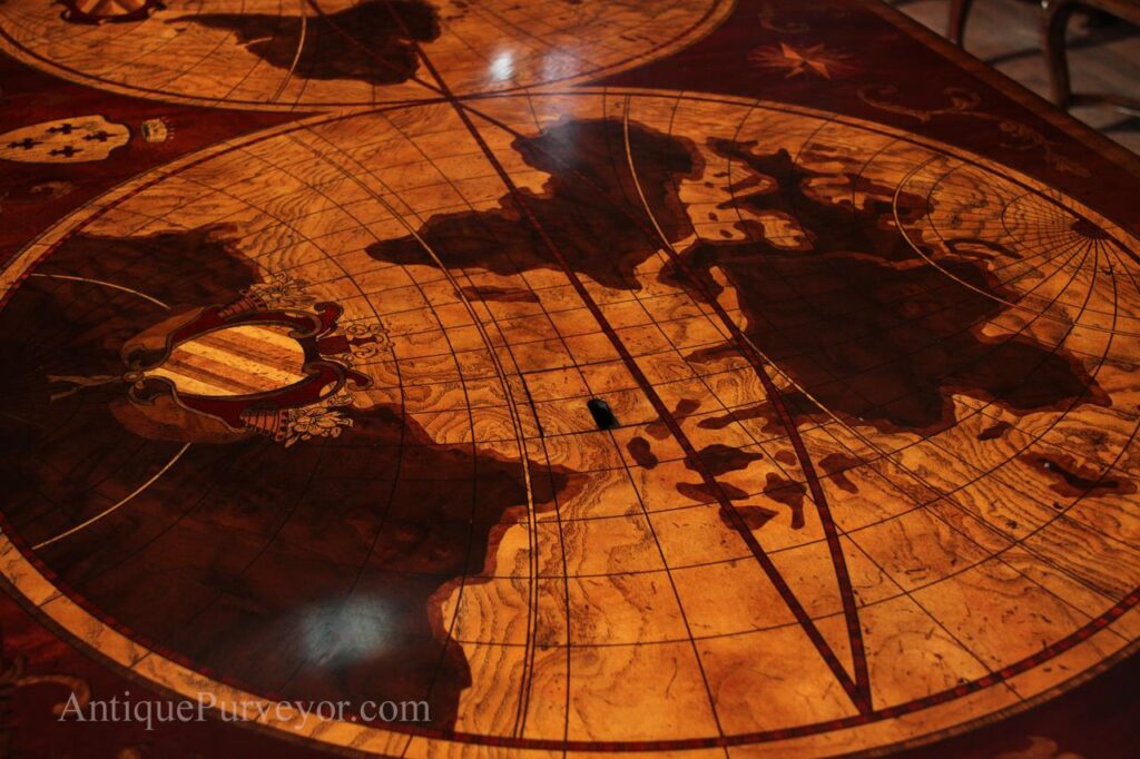 Oval mahogany, walnut and satinwood map desk by Maitland Smith ...